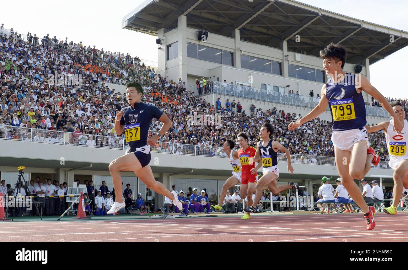 Japanese sprinter Yoshihide Kiryu, left, compete in 100-meter final ...