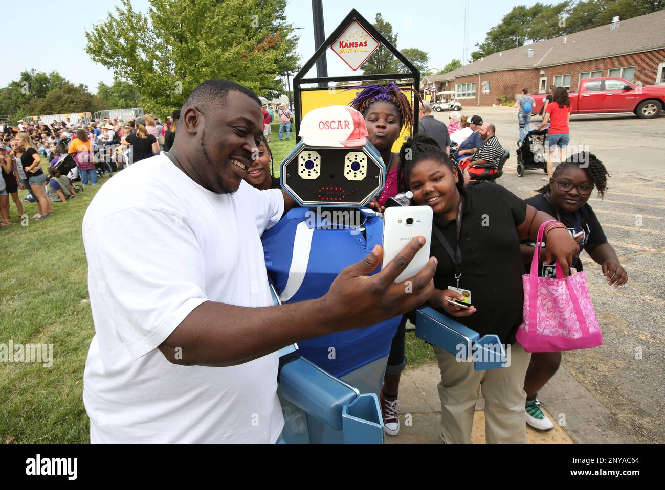 Coleman Middle School teacher Sean Gates takes a selfie with Oscar the ...
