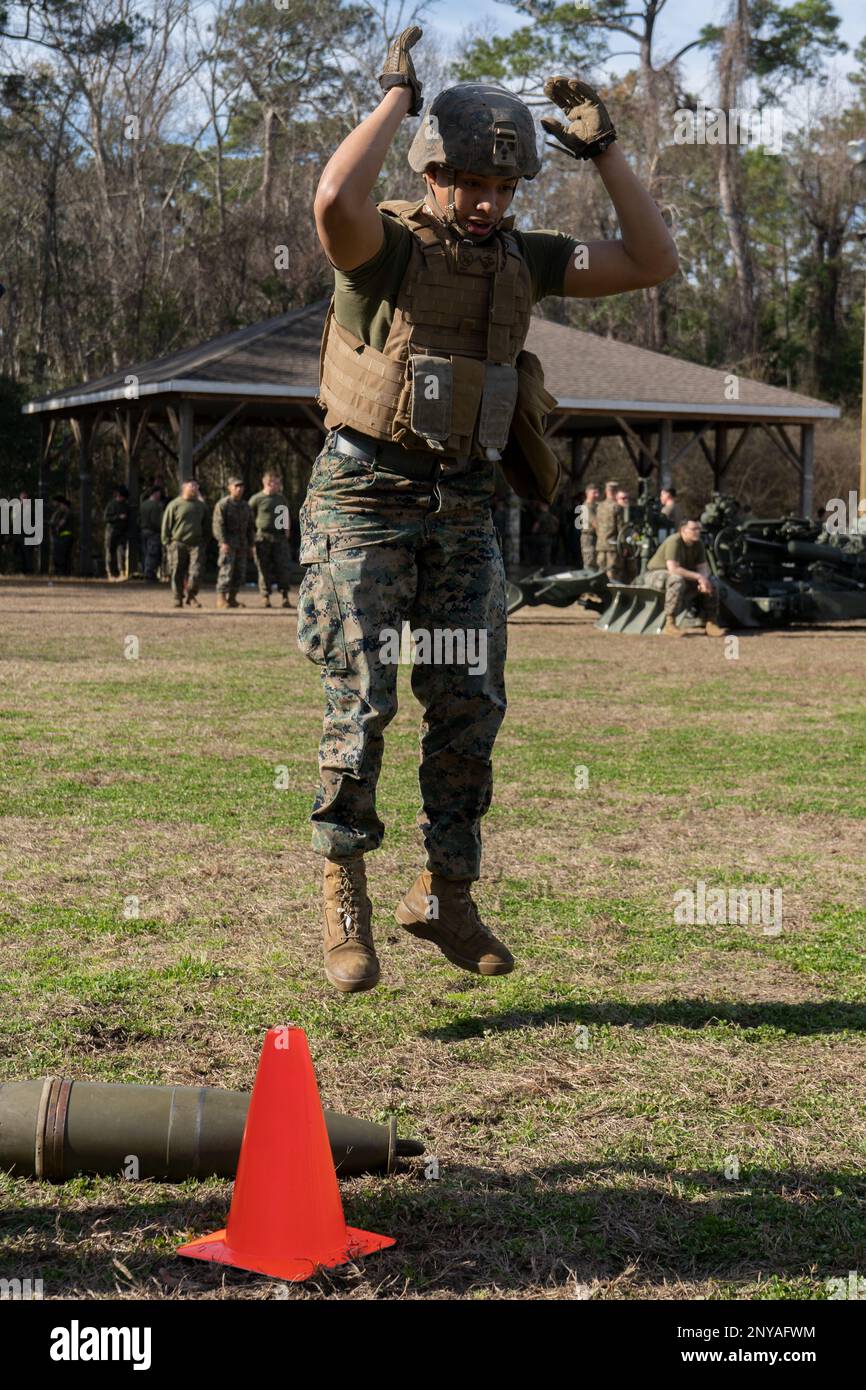 A U.S. Marine with 10th Marine Regiment, 2d Marine Division, conducts ...