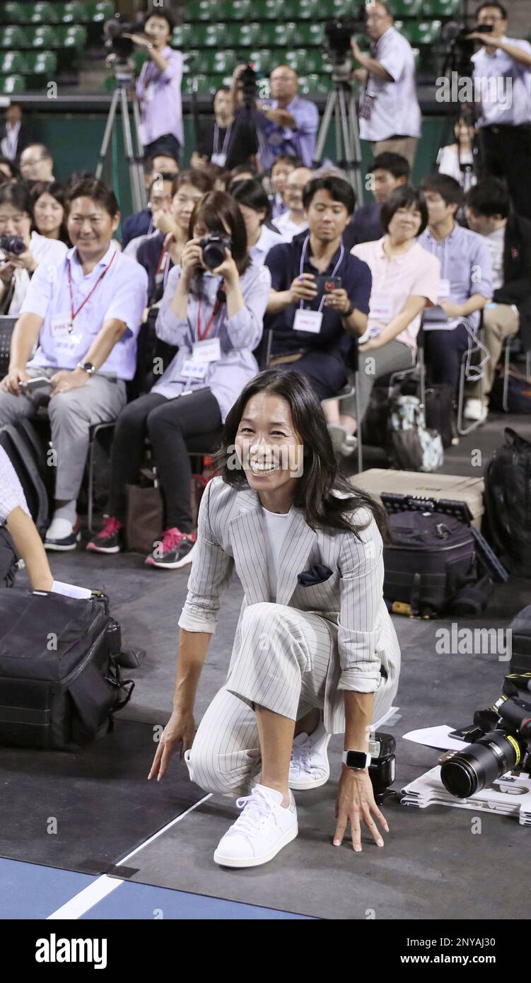 Japanese tennis player Kimiko Date poses for photo after a press ...