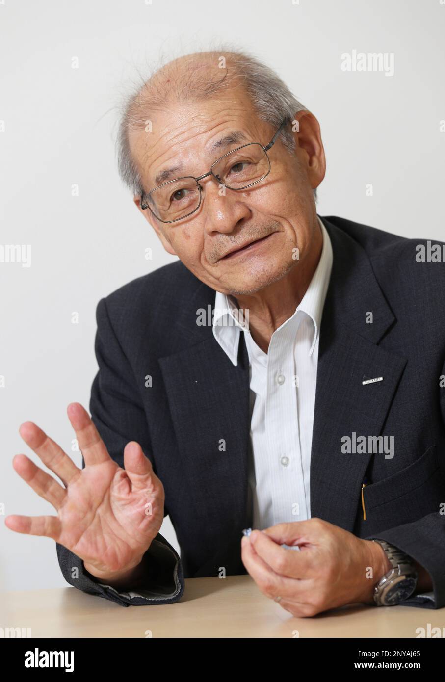 Akira Yoshino, a Japanese chemist, speaks during an interview conducted ...