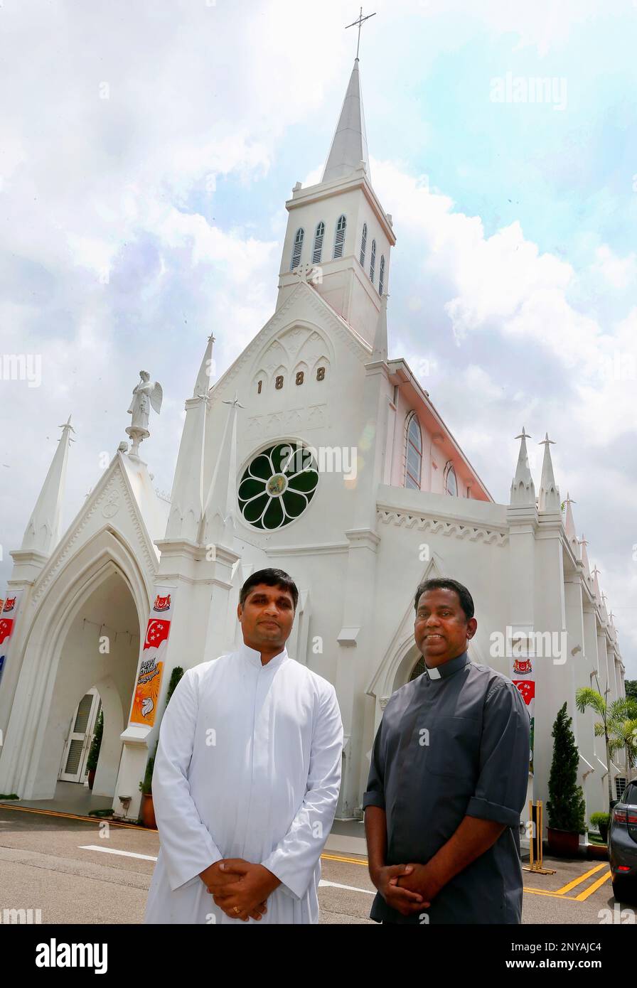 Reverend Father Michael Sitaram, 62, (right) Parish Priest and Reverend ...