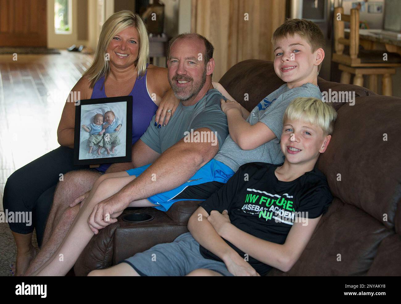 In this Aug. 29, 2017, photo, Heather Fuller, from left, joins her ...