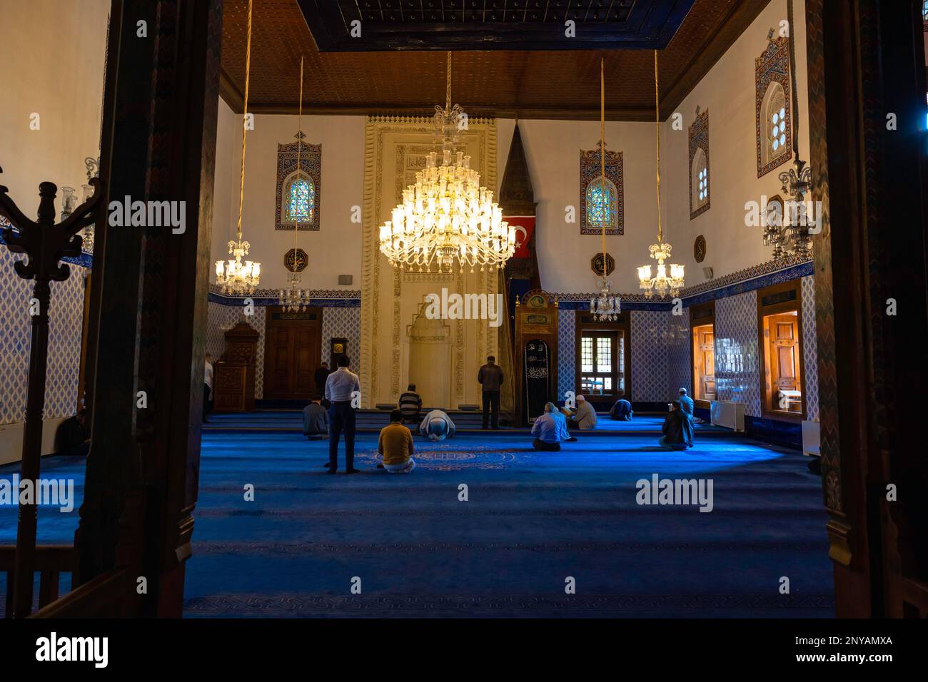 Haci Bayram Veli Mosque and muslim men praying. Ramadan or islamic ...