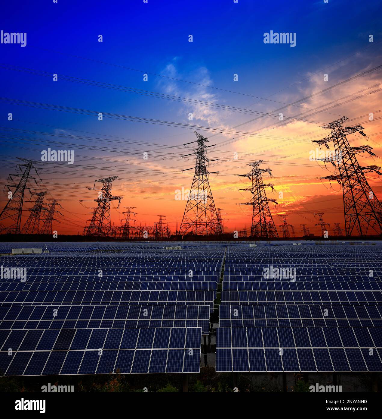 Solar panels and pylon, green environmental protection Stock Photo - Alamy