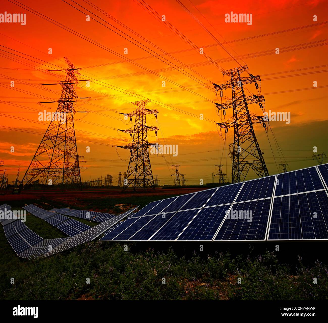 Solar panels and pylon, green environmental protection Stock Photo - Alamy