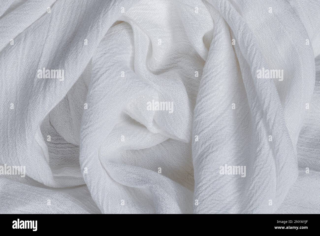 Wrinkled white viscose fabric. Artificial fiber from natural wood pulp ...