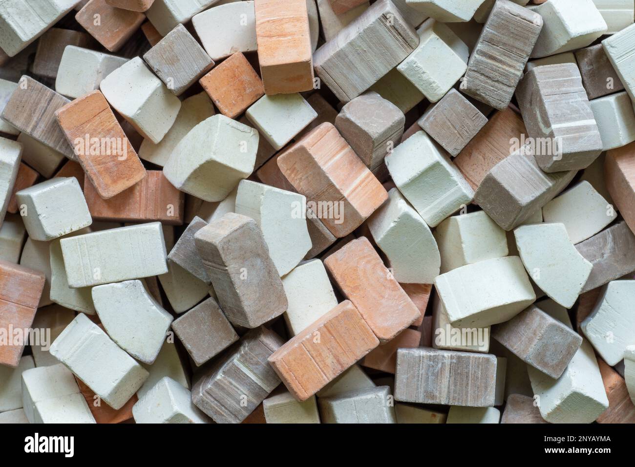 A pile of varied color miniature toy bricks as the background ...