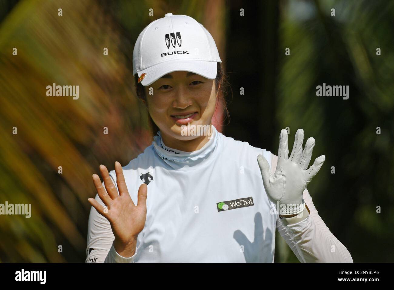 Singapore. 2nd Mar, 2023. Liu Yu of China waves her hands on the first ...