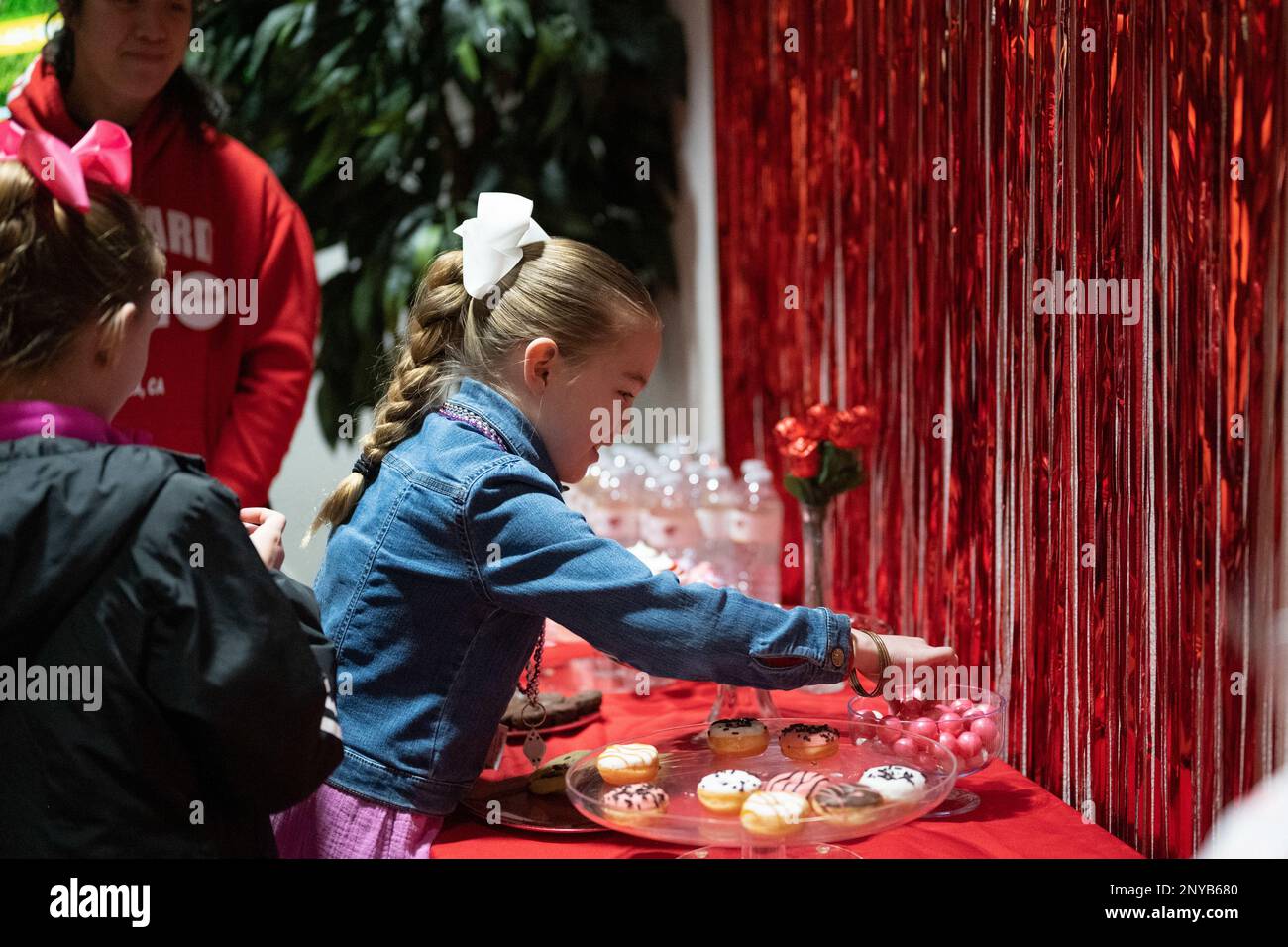 A child takes candy during an Exceptional Family Member Program ...