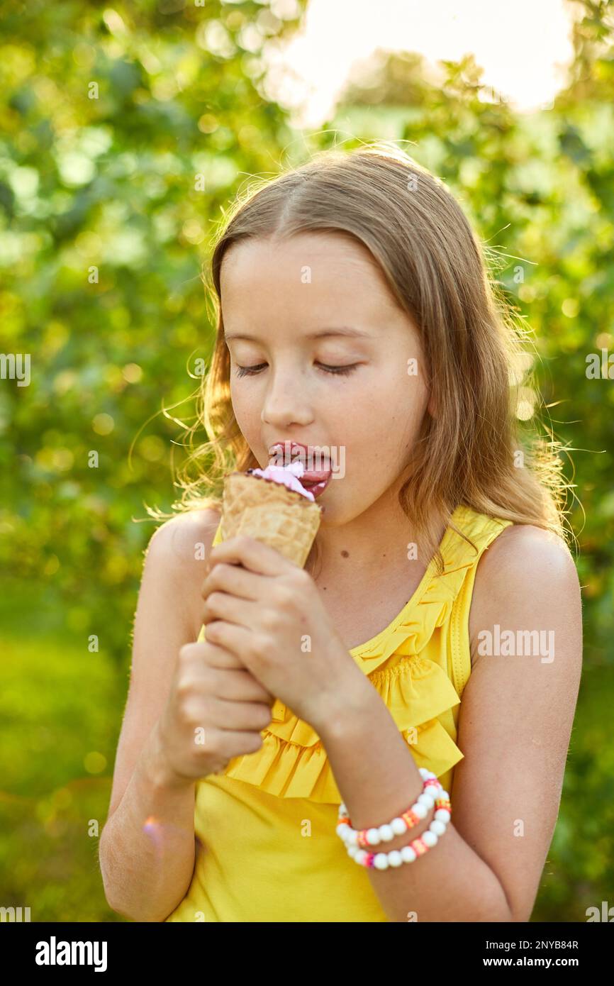 Happy Girl With Braces Eating Italian Ice Cream Cone Smiling While