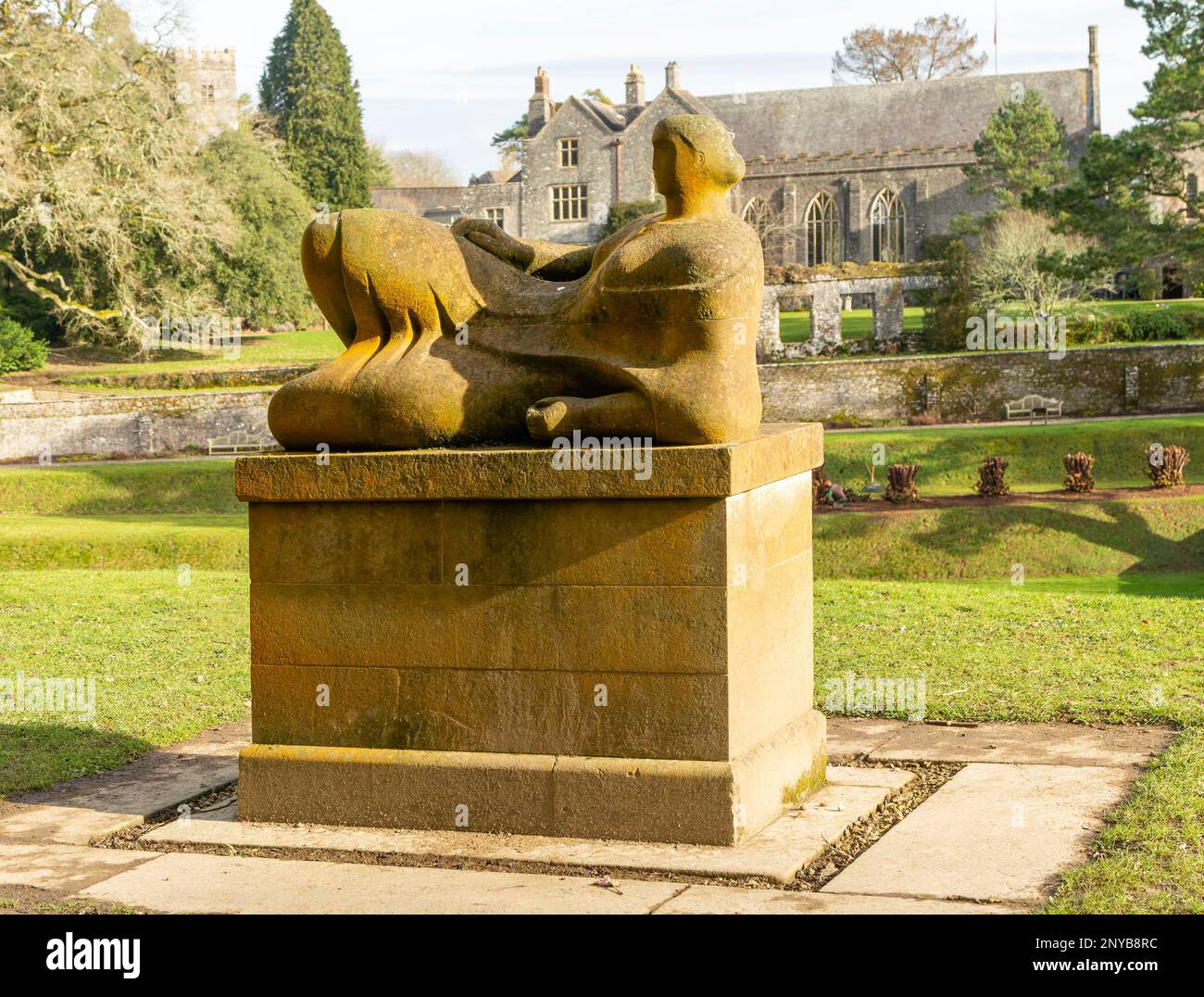 'Reclining Figure' sculpture 1946 by Henry Moore in garden, Dartington Hall estate gardens ...
