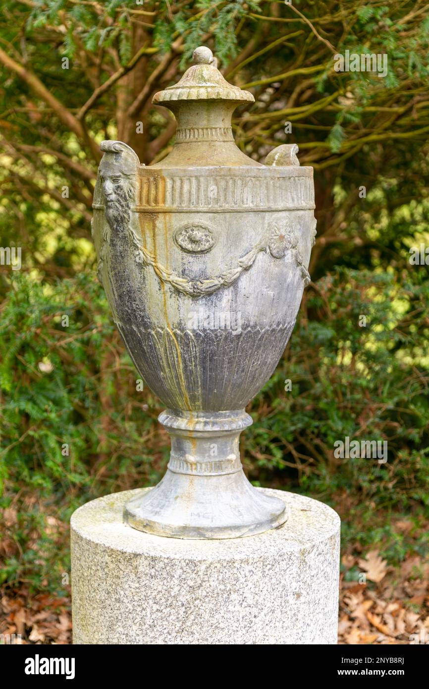 Classical urn artwork in garden, Dartington Hall estate gardens, south ...