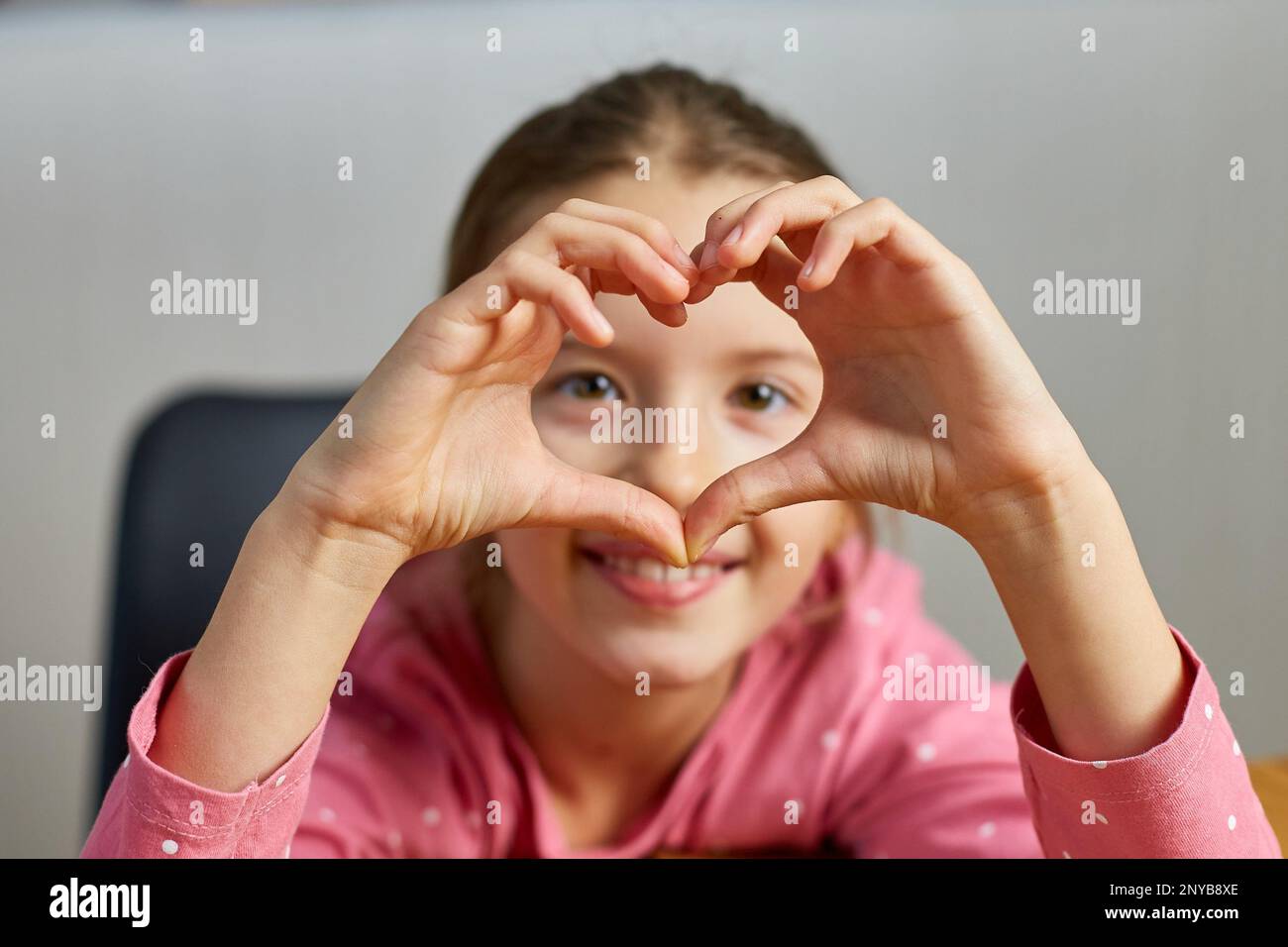 Hand showing sign heart hi-res stock photography and images - Alamy