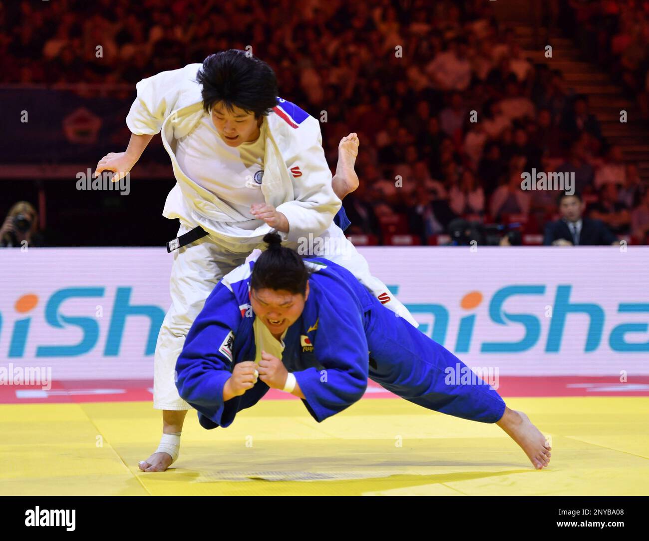 China's Song Yu(top) competes against Japan's Sarah Asahina in the ...