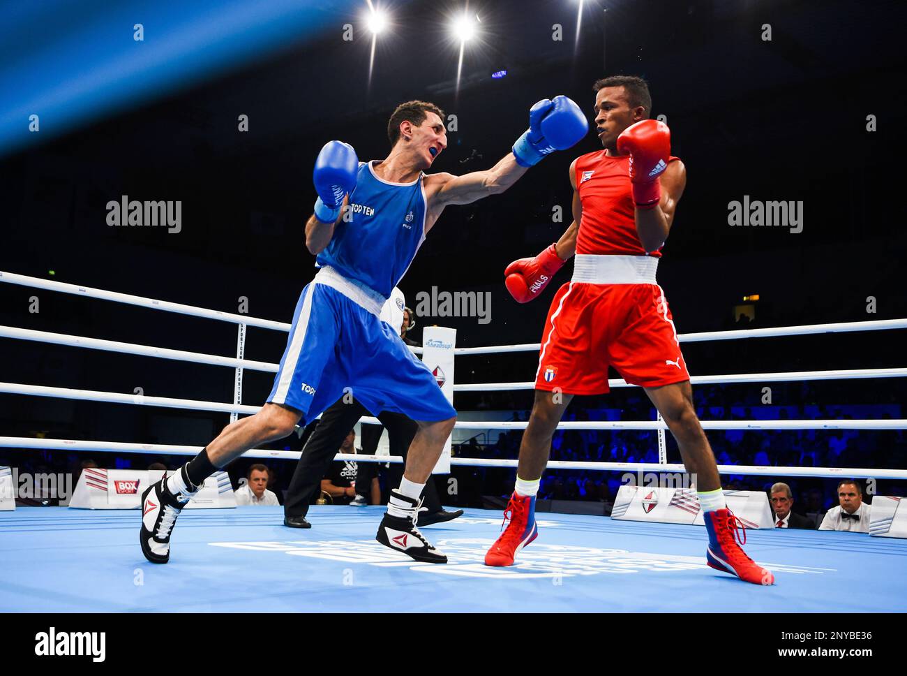 Cuban boxer Lazaro Alvarez Estrada, right, fights against France's ...