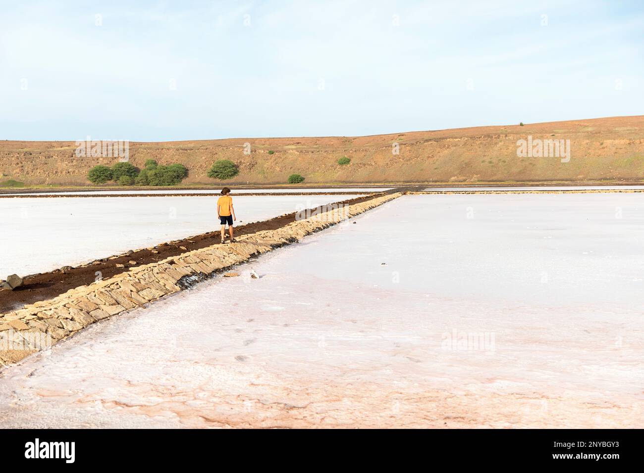 Boy, tourist, exploring Spectacular salt pans of Pedra de Lume in a ...