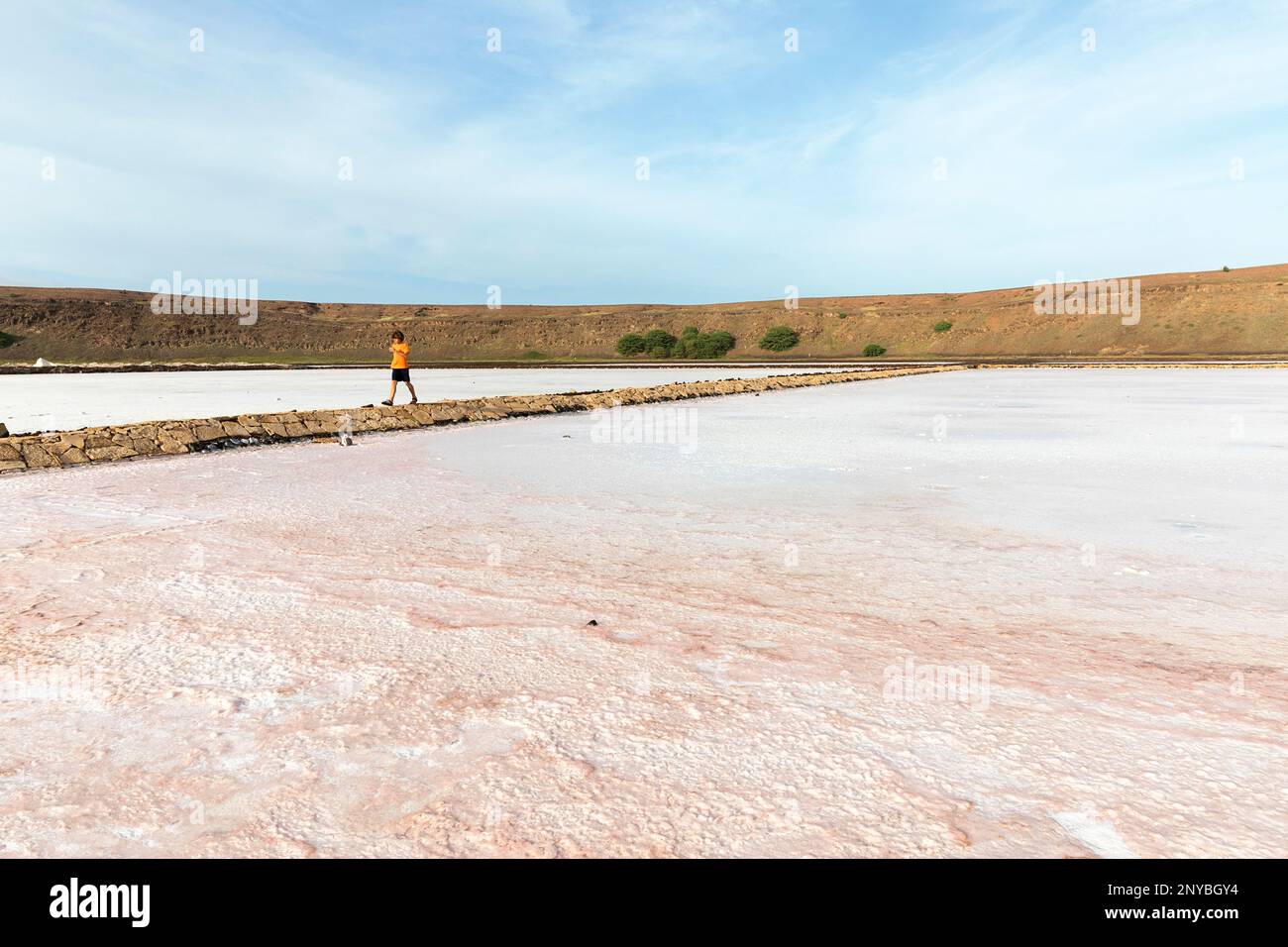 Boy, tourist, exploring Spectacular salt pans of Pedra de Lume in a ...