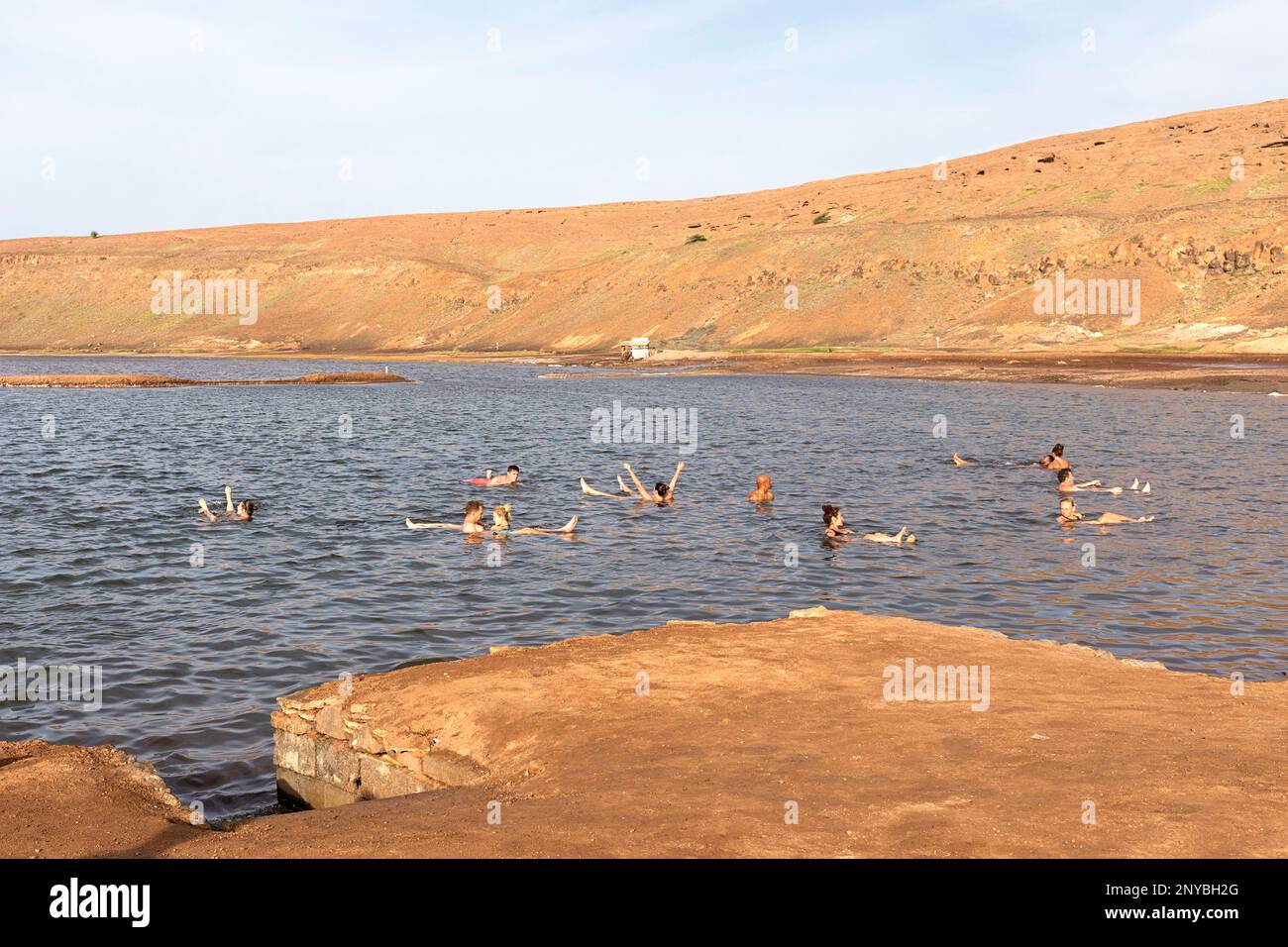 Tourists, swimming in a salty lake in Spectacular salt pans of Pedra de ...