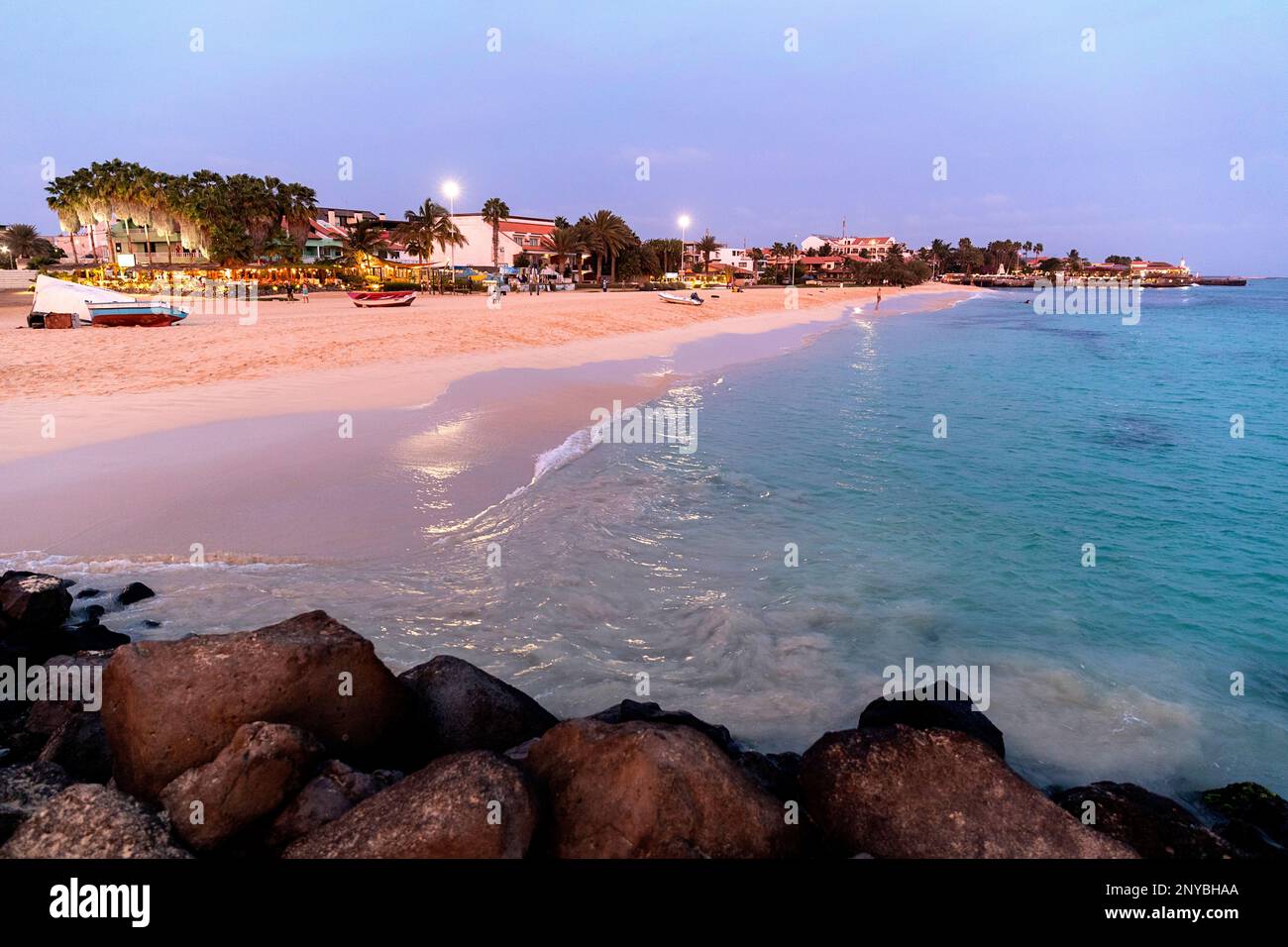 Beautiful golden sandy beach with restaurants and hotels at the back in ...