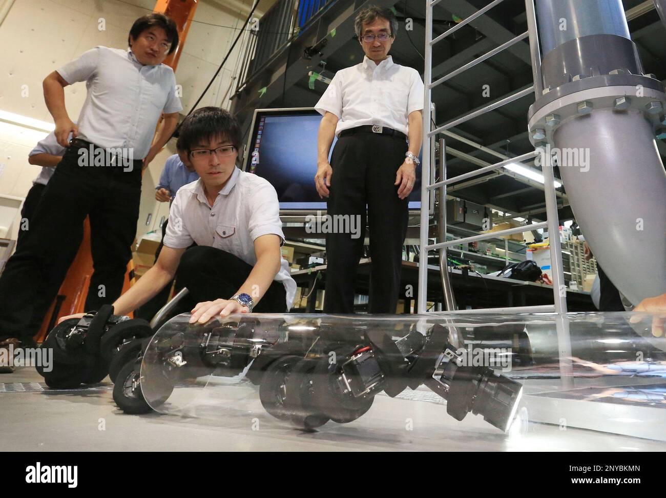 A snake-shaped robot, demonstrated by researchers of Kyoto University ...