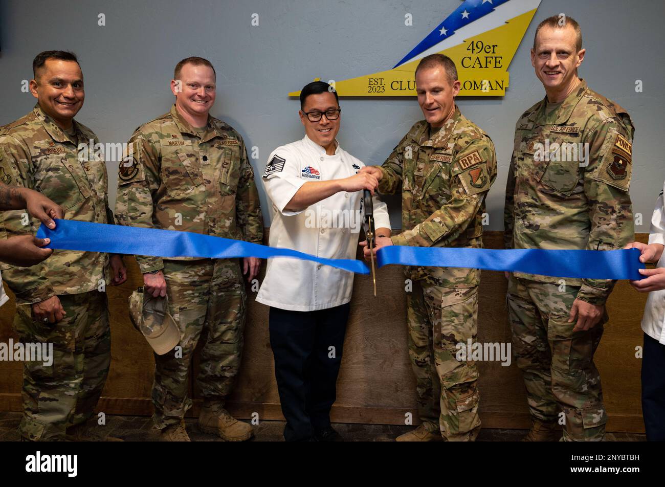 Leadership from the 49th Wing cut a ribbon during the grand opening of ...