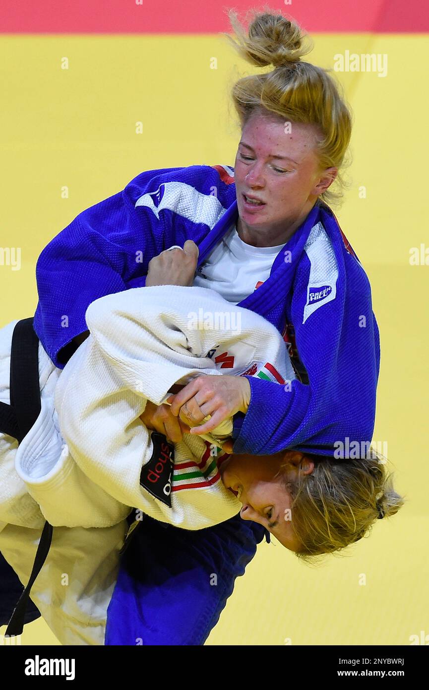 Madelene Rubinstein, in blue, of Norway and Katinka Szabo of Hungary ...