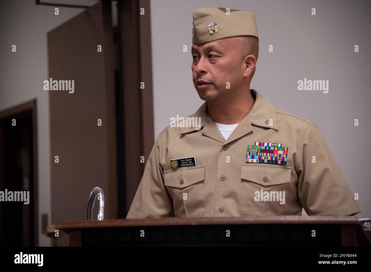 MILLINGTON, Tennessee (Jan. 7, 2023) - Cmdr. Anvy T. Nguyen reads his ...