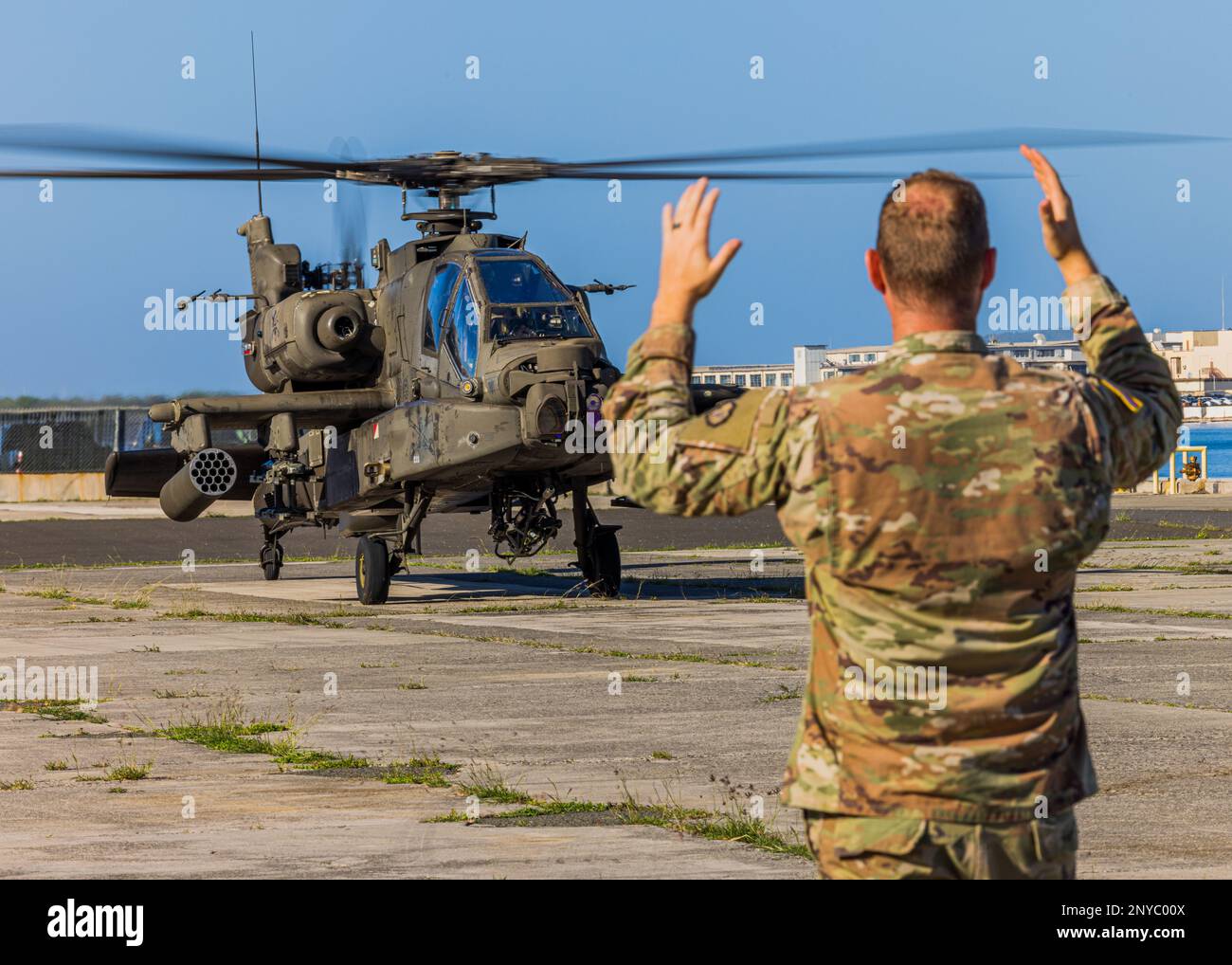 Soldiers assigned to the 25th Infantry Division prepare to ship AH-64 ...