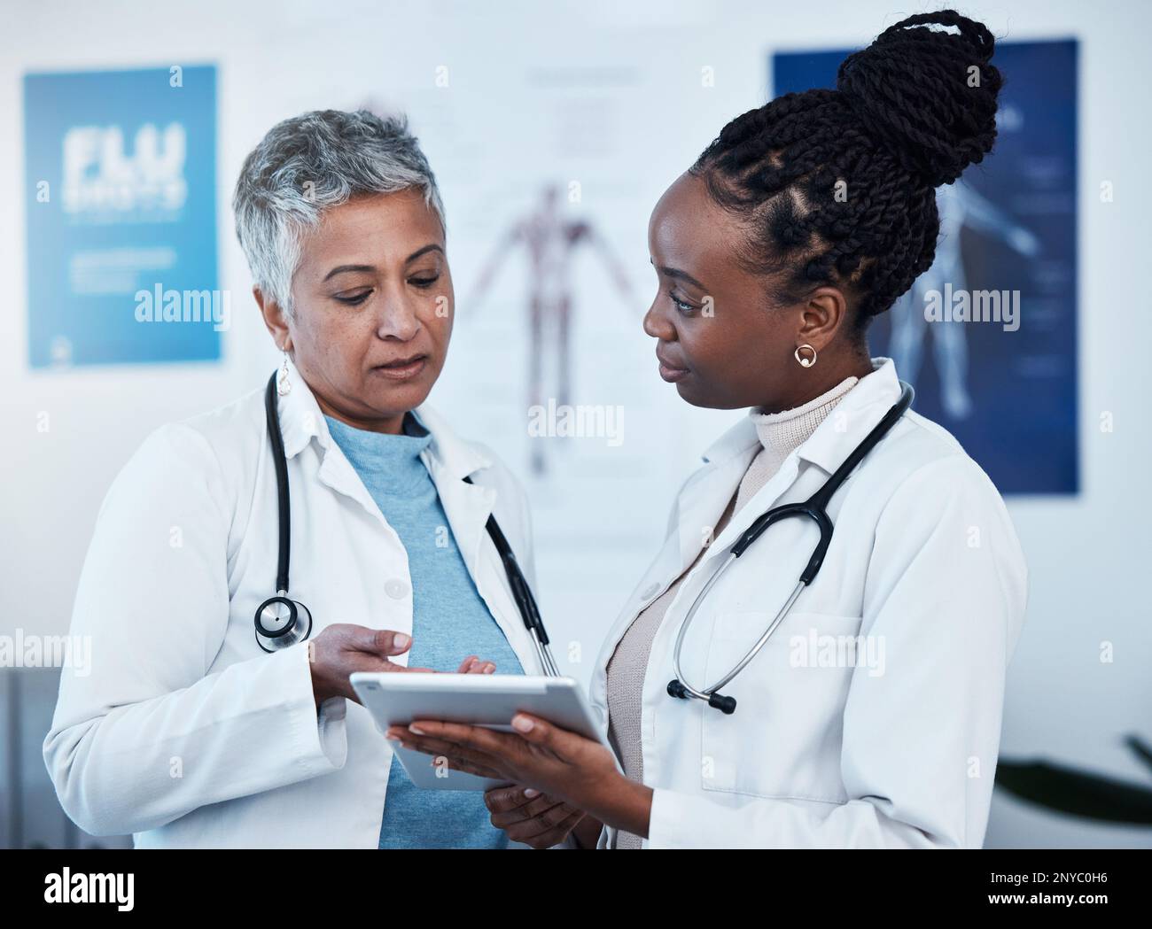 Team collaboration, tablet and doctors communication on medical ...