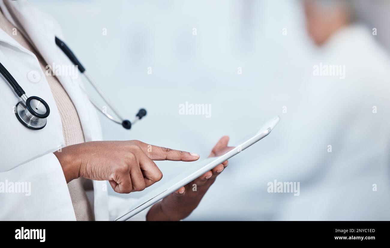 Hands, digital tablet and doctor at hospital, online and browsing ...