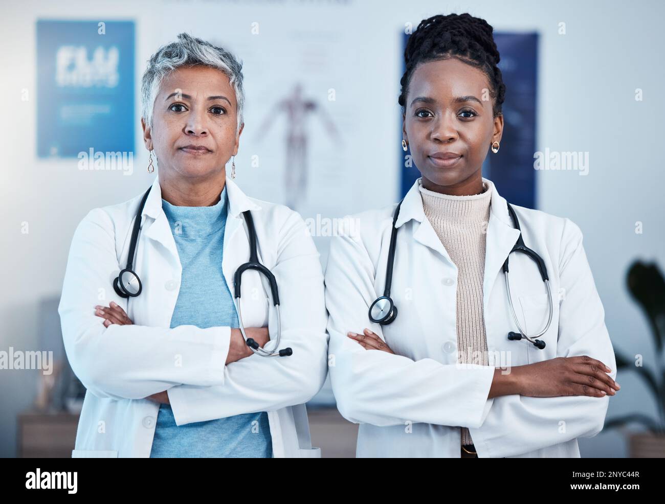 Portrait, serious and proud doctor team in hospital with vision, goal ...