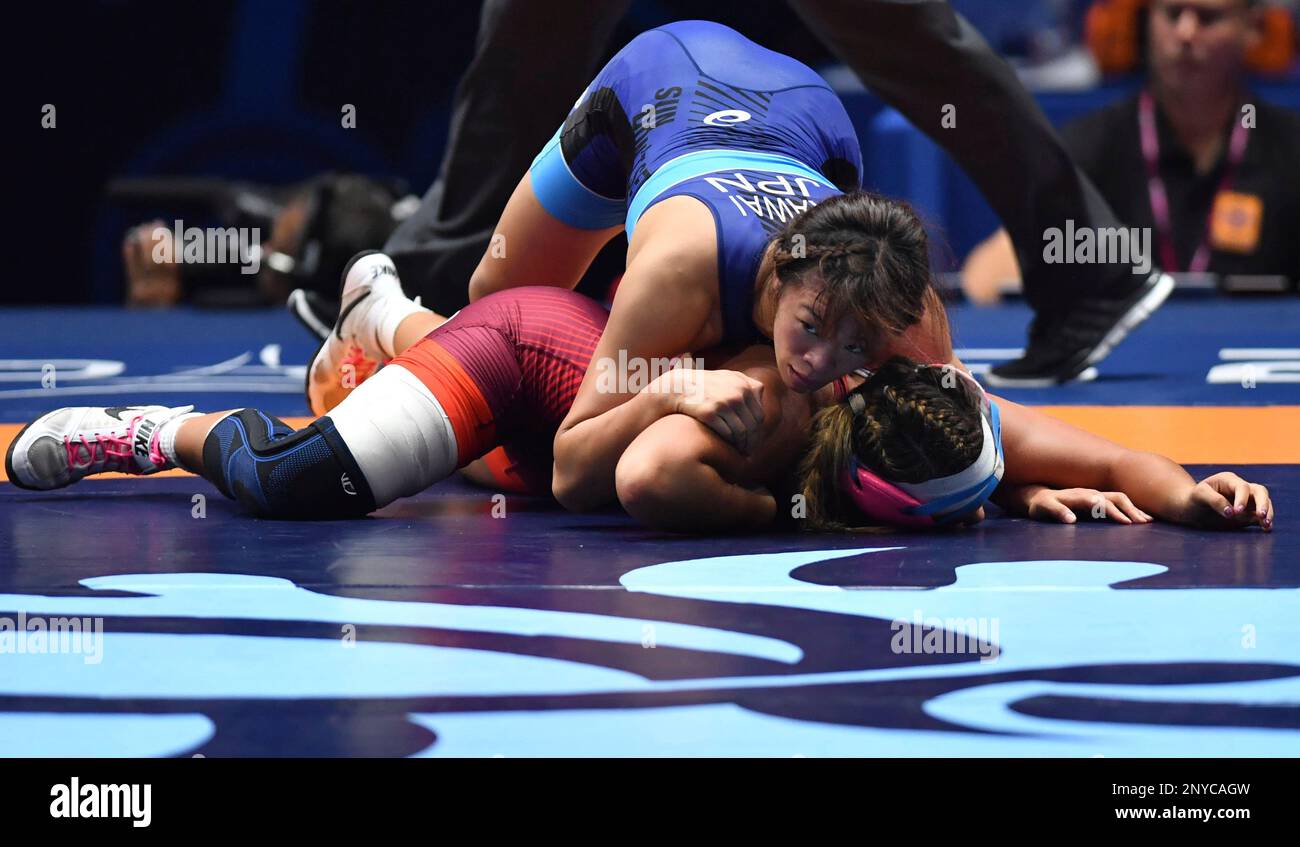 Rikako Kawai (top) of Japan attacks Allison Mackenzie Ragan of America ...