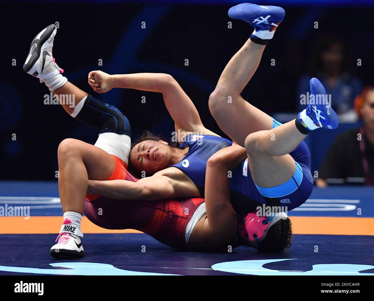 Rikako Kawai(R) of Japan attacks Allison Mackenzie Ragan of America in ...