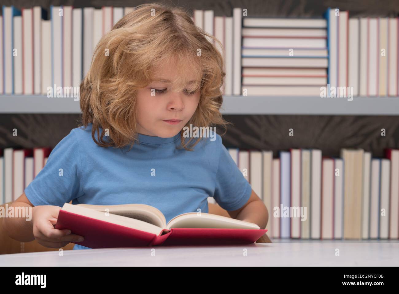 Pupil with book. Back to school. School kid pupil studying in school ...