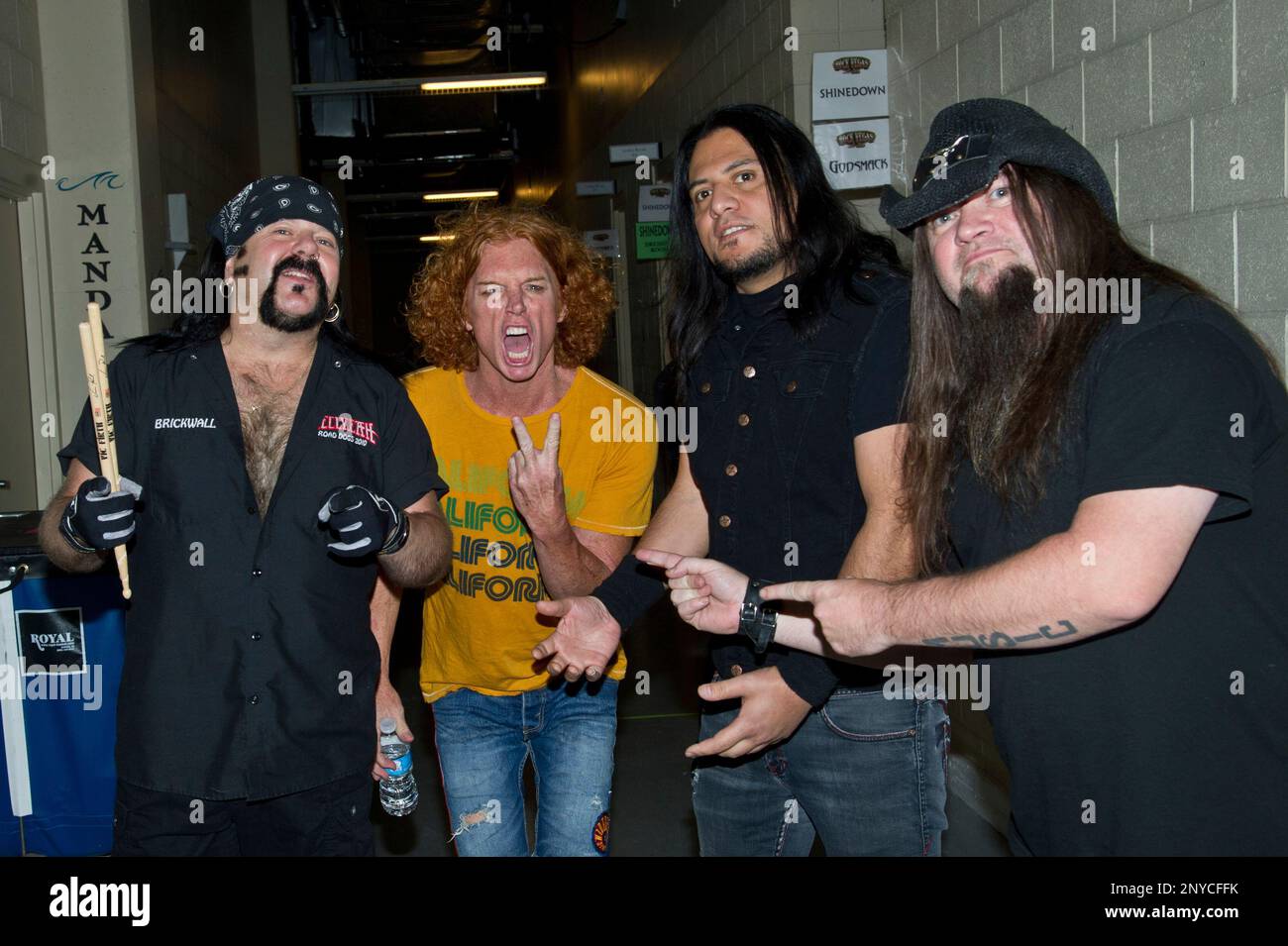 Carrot Top poses with Vinnie Paul, Bob Zilla, and Greg Tribbett of ...