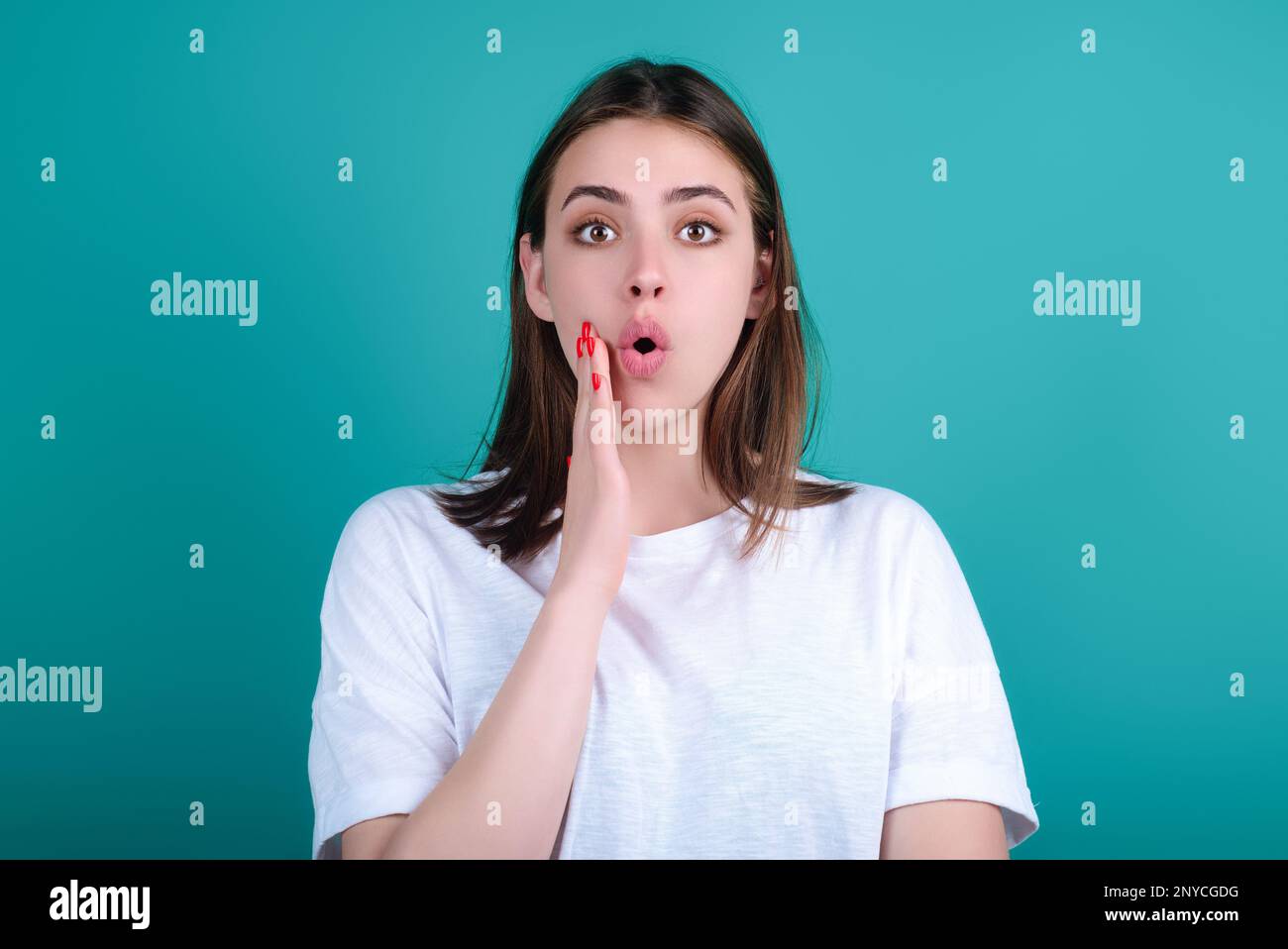 Beautiful female portrait isolated on studio backgroud. Emotional ...