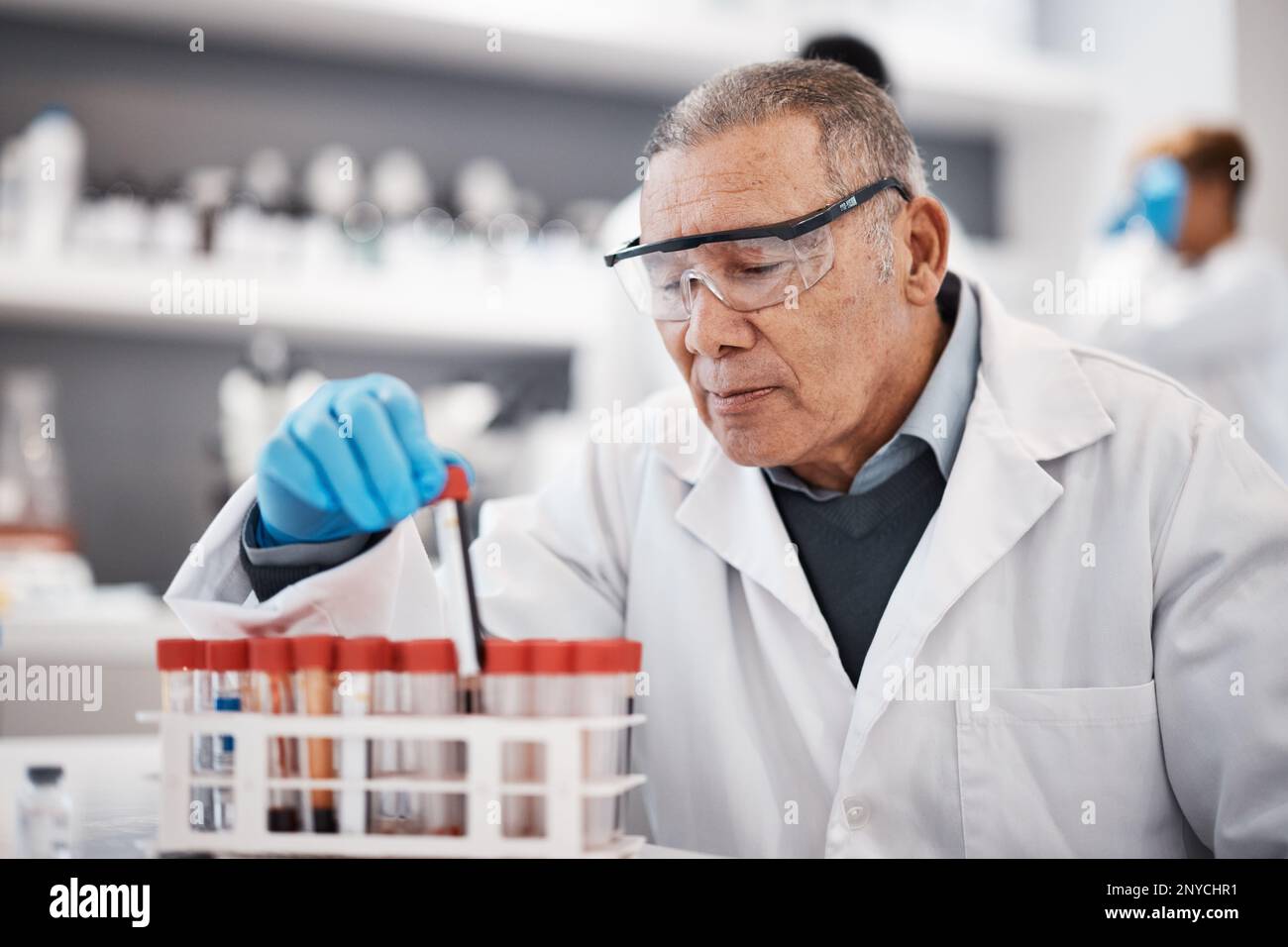 Blood, science and scientist in laboratory with sample for research ...