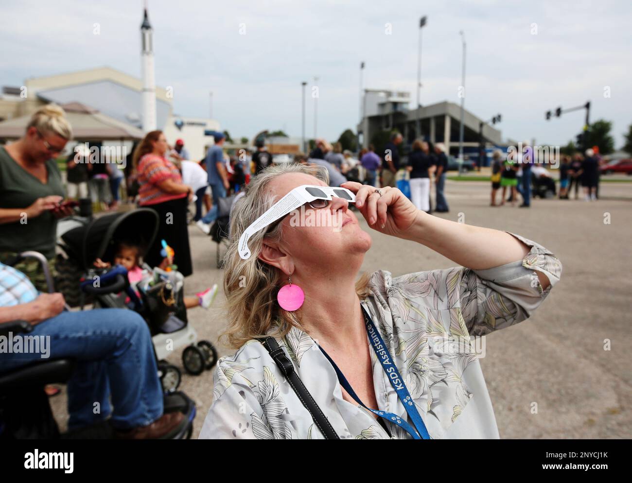 Joleen Pianalto looks up at the solar eclipse during the Mission ...