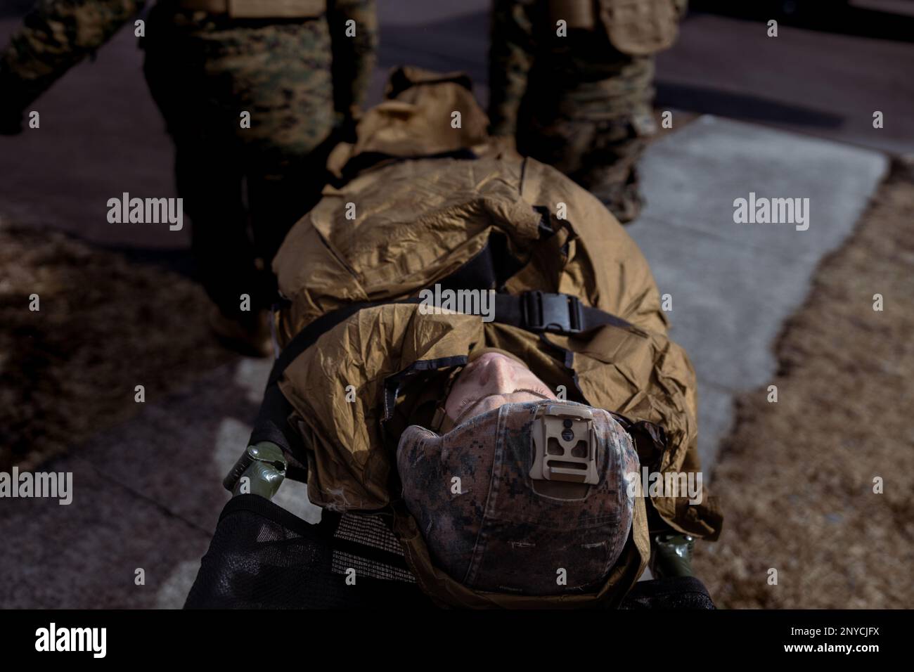U.S. Navy Petty Officer 2nd Class Tucker Berry, a corpsman with 3d ...