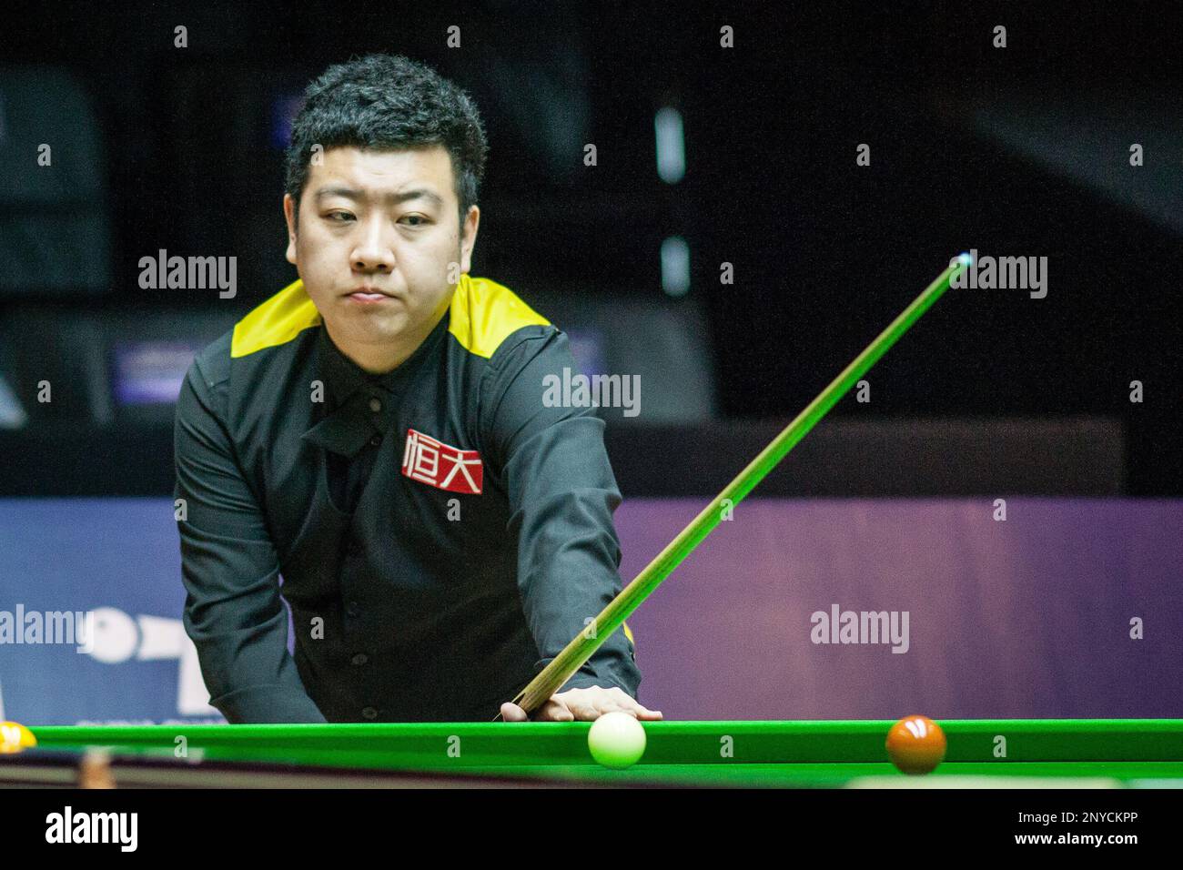 Li Hang of China considers a shot to Luca Brecel of Belgium in the ...