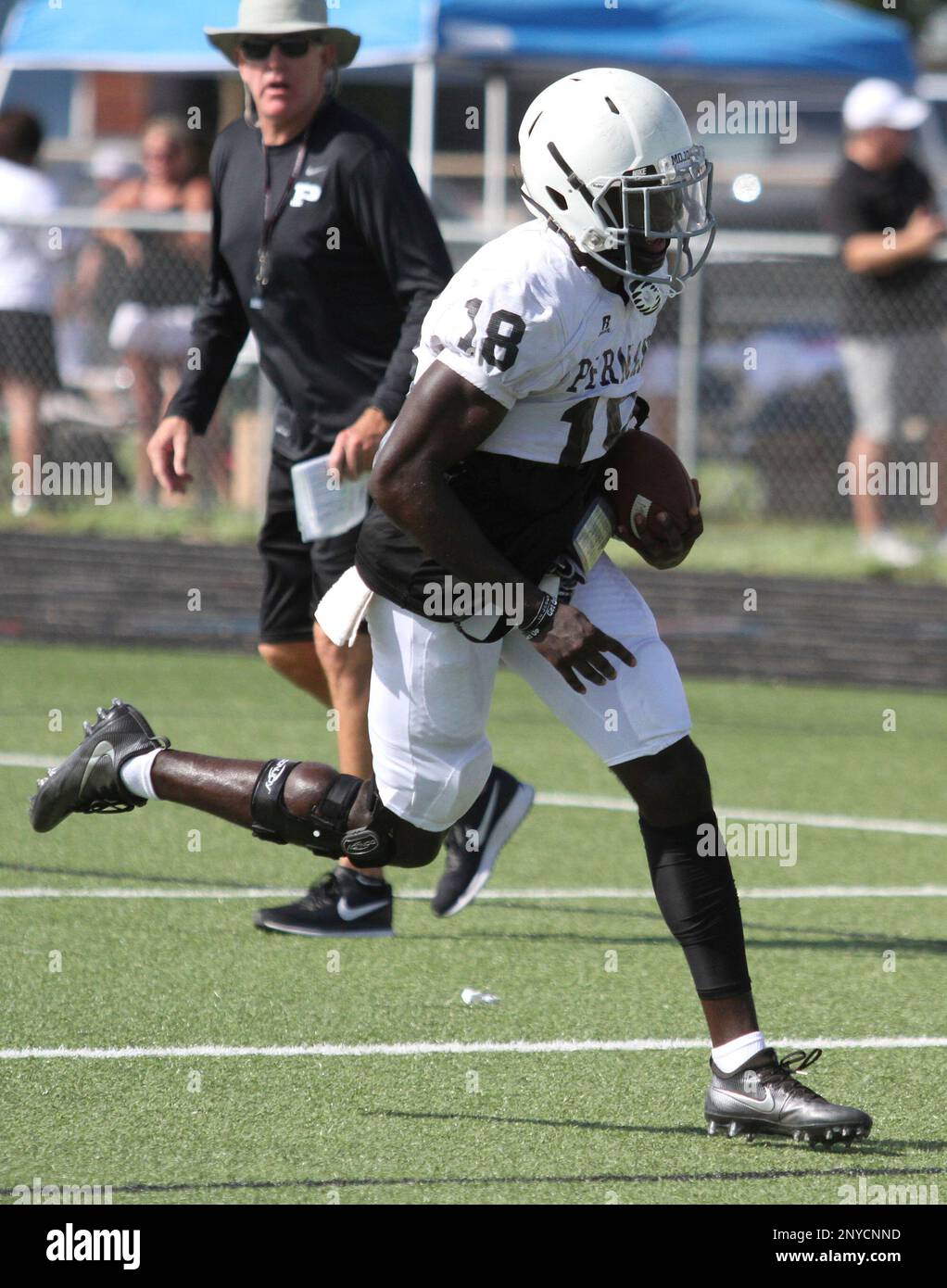 Permian Panthers' Brother Miller runs the ball as coach Blake Feldt ...