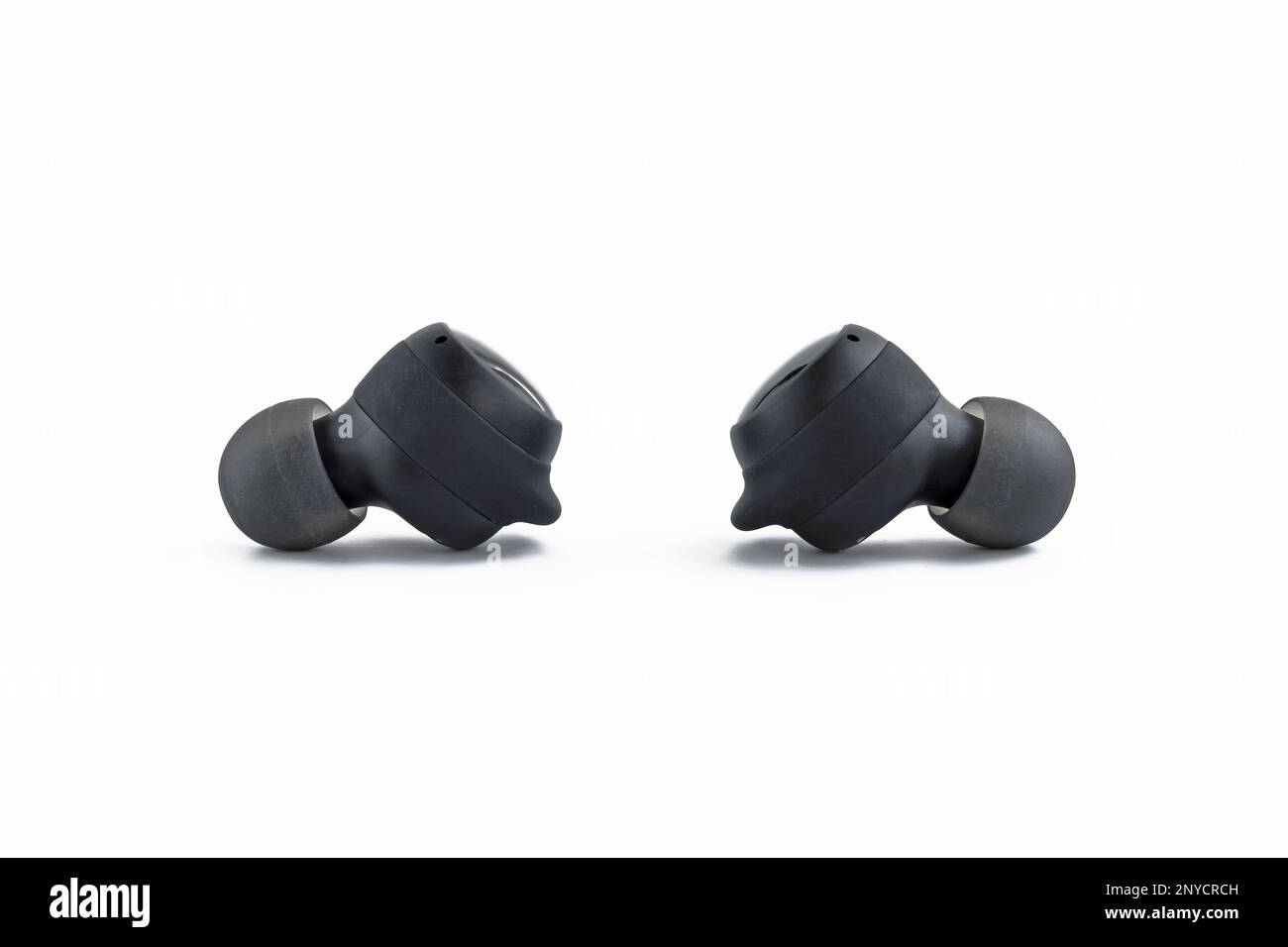 Small wireless black headphones isolated on white background Stock ...