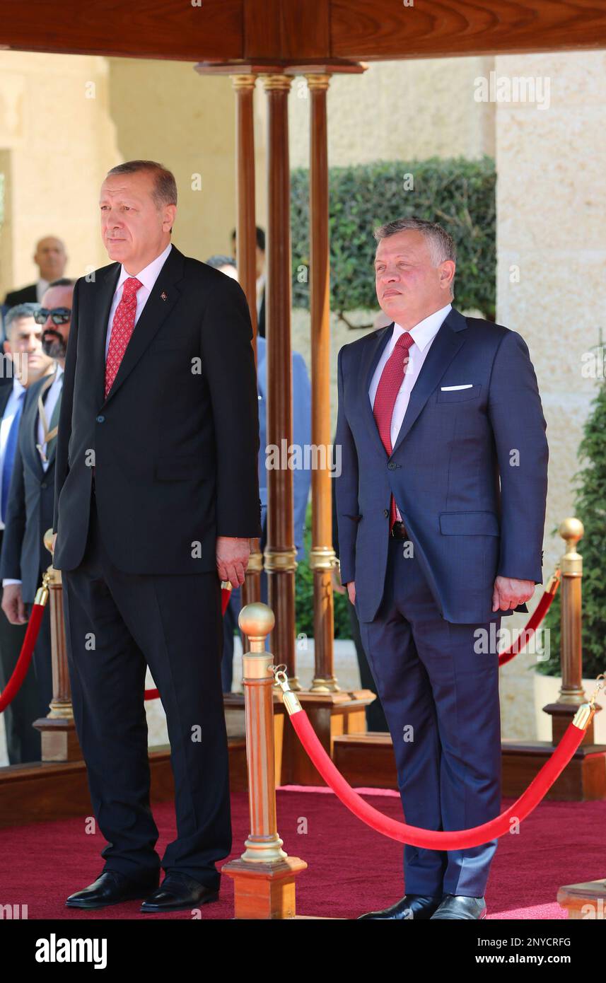 Jordan's King Abdullah II, right, stands with Turkey's President Recep ...