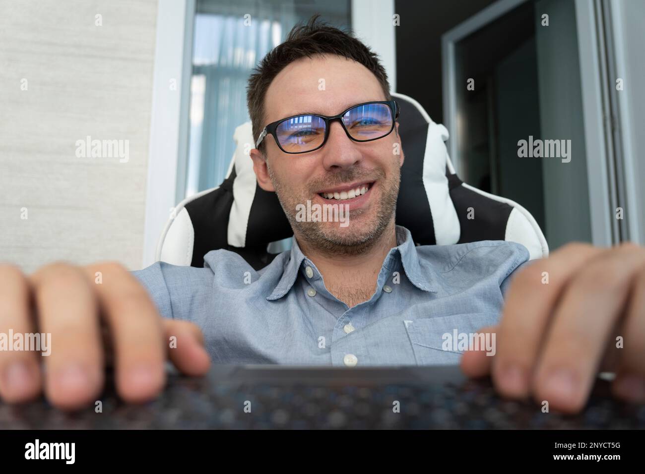 Professional copywriter working freelance project, typing on keyboard ...