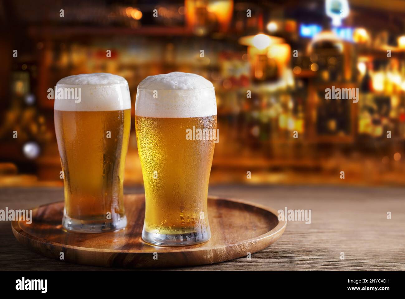 Cold glasses of beer in a bar Stock Photo - Alamy