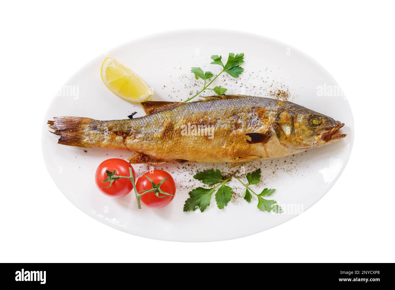 Plate of baked sea bass isolated on white background, top view Stock ...