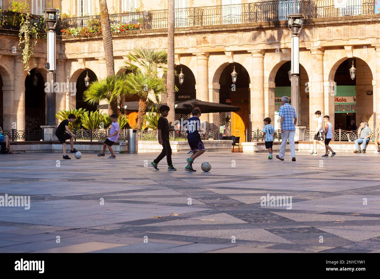 Bilbao, Spain - August 02, 2022: Group of children playing soccer or ...