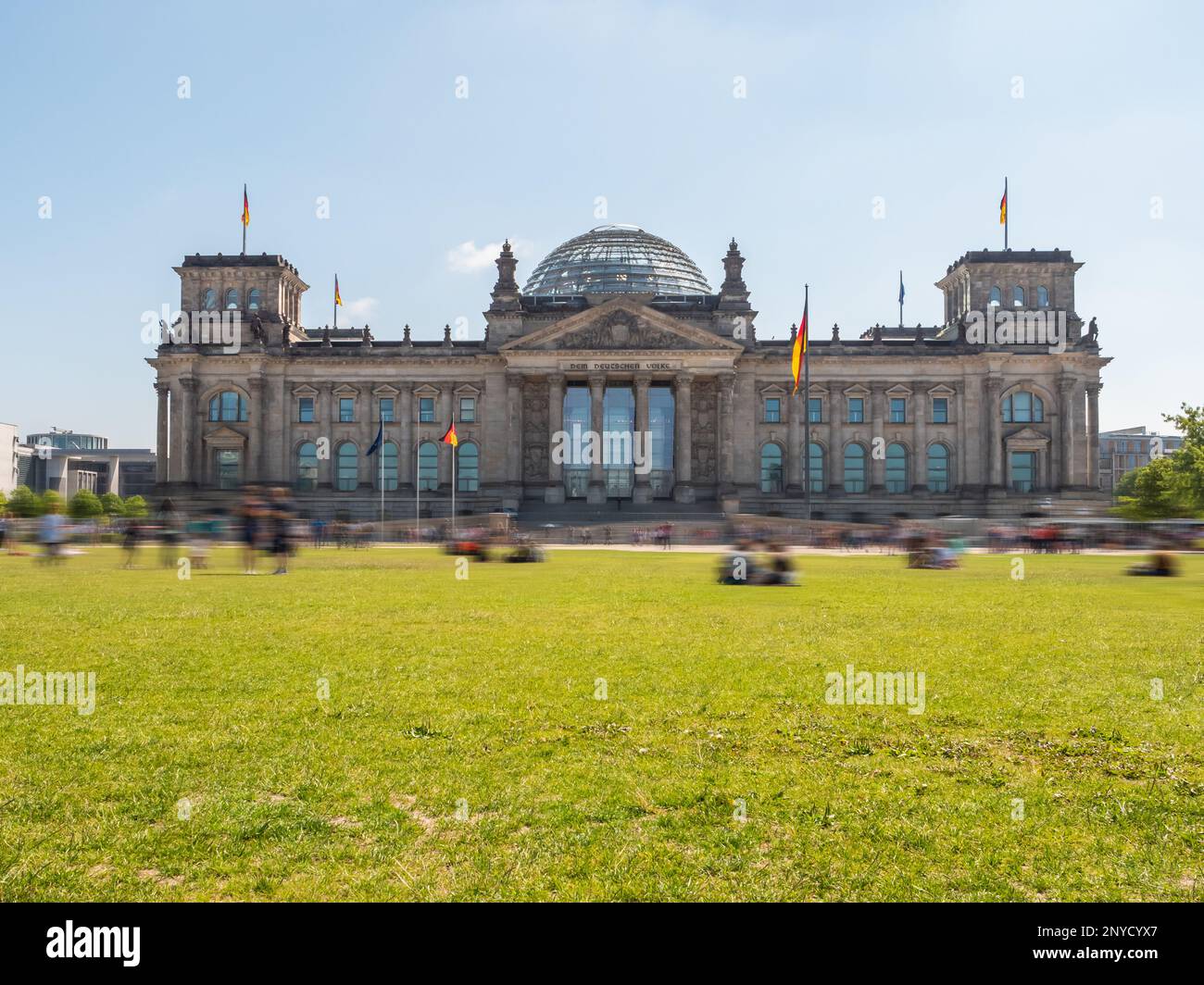 Famous Bundestag Berlin Building during summer with german flags ...