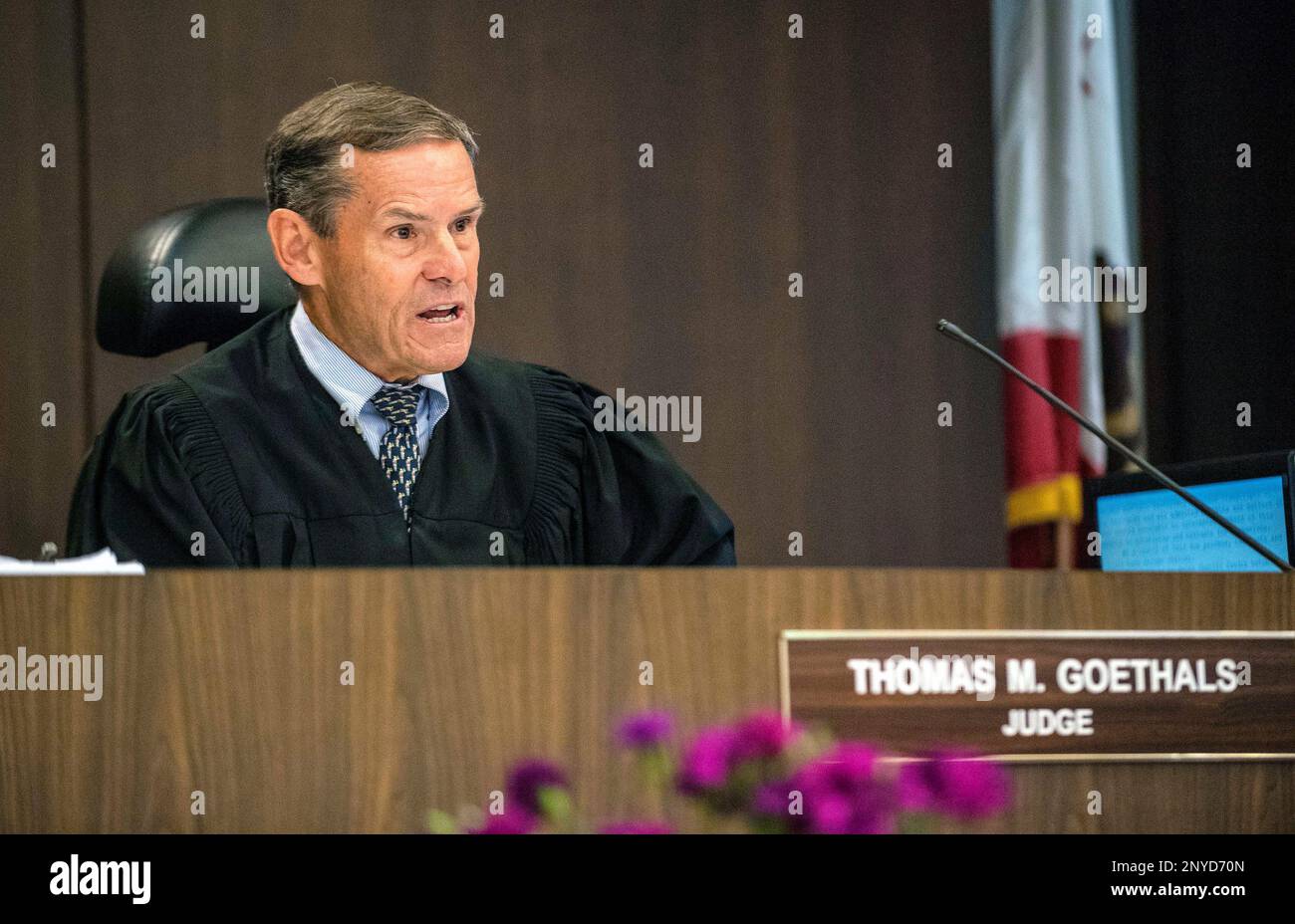 Orange County Superior Court Judge Thomas Goethals reads a portion of ...
